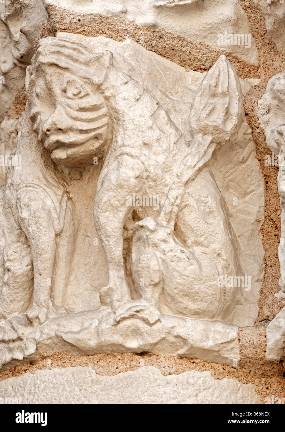 Romanesque stone bas relief on portal of the cathedral Notre Dame la ...