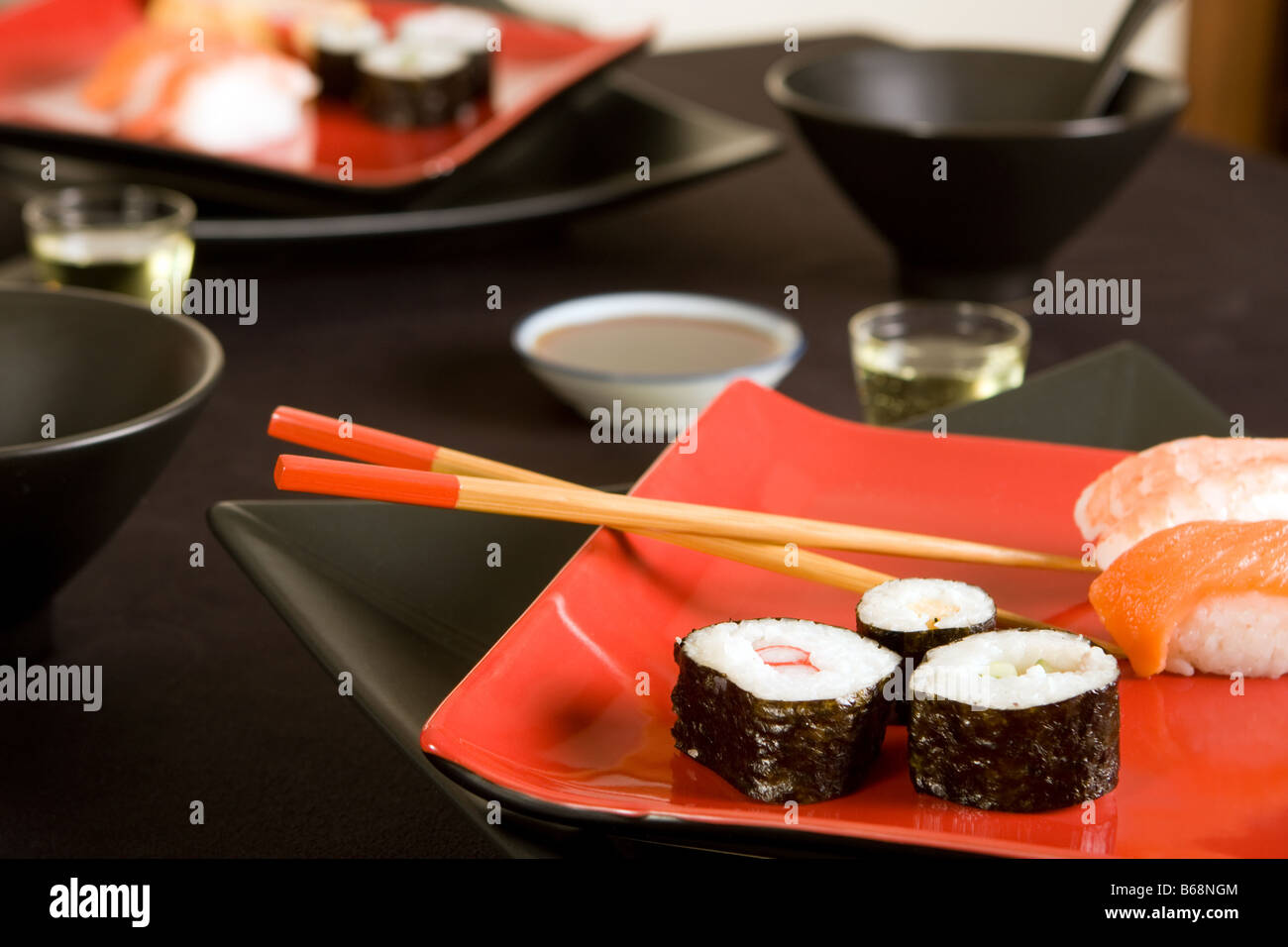Japanese dinner setting with sushi chopsticks and sake Stock Photo - Alamy