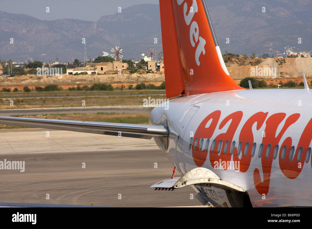 Tail and rear of passenger jet showing heat haze from operating ...