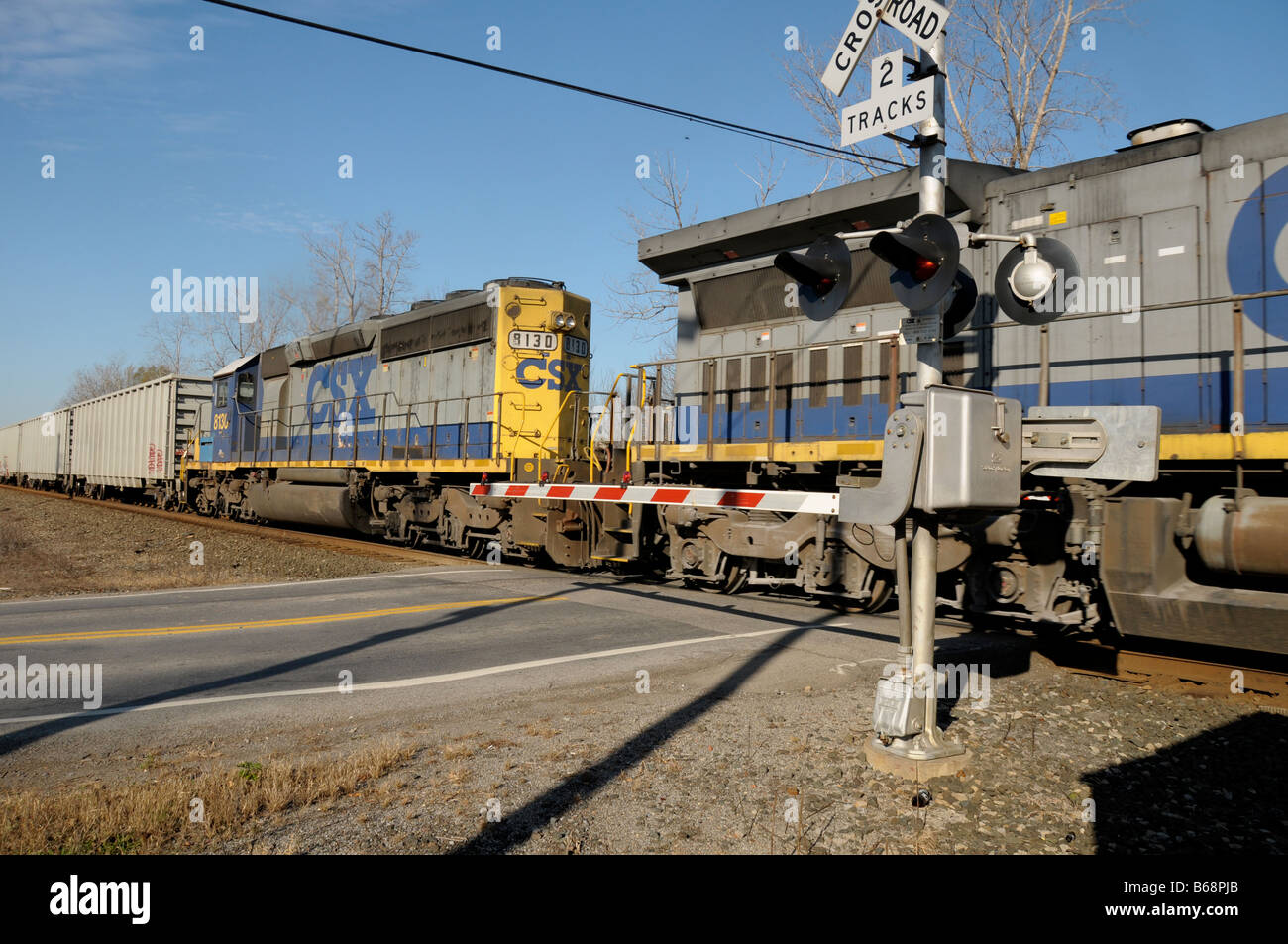 Freight train passing railroad crossing in Fairport NY, USA Stock Photo ...