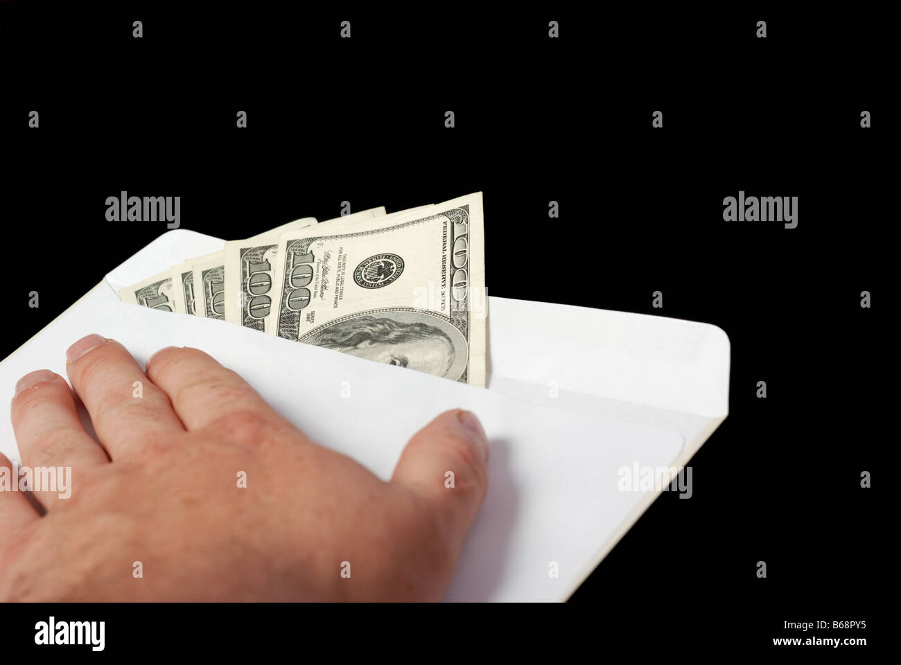 Bribe Criminal activity payoff Money enclosed in an envelope Stock ...