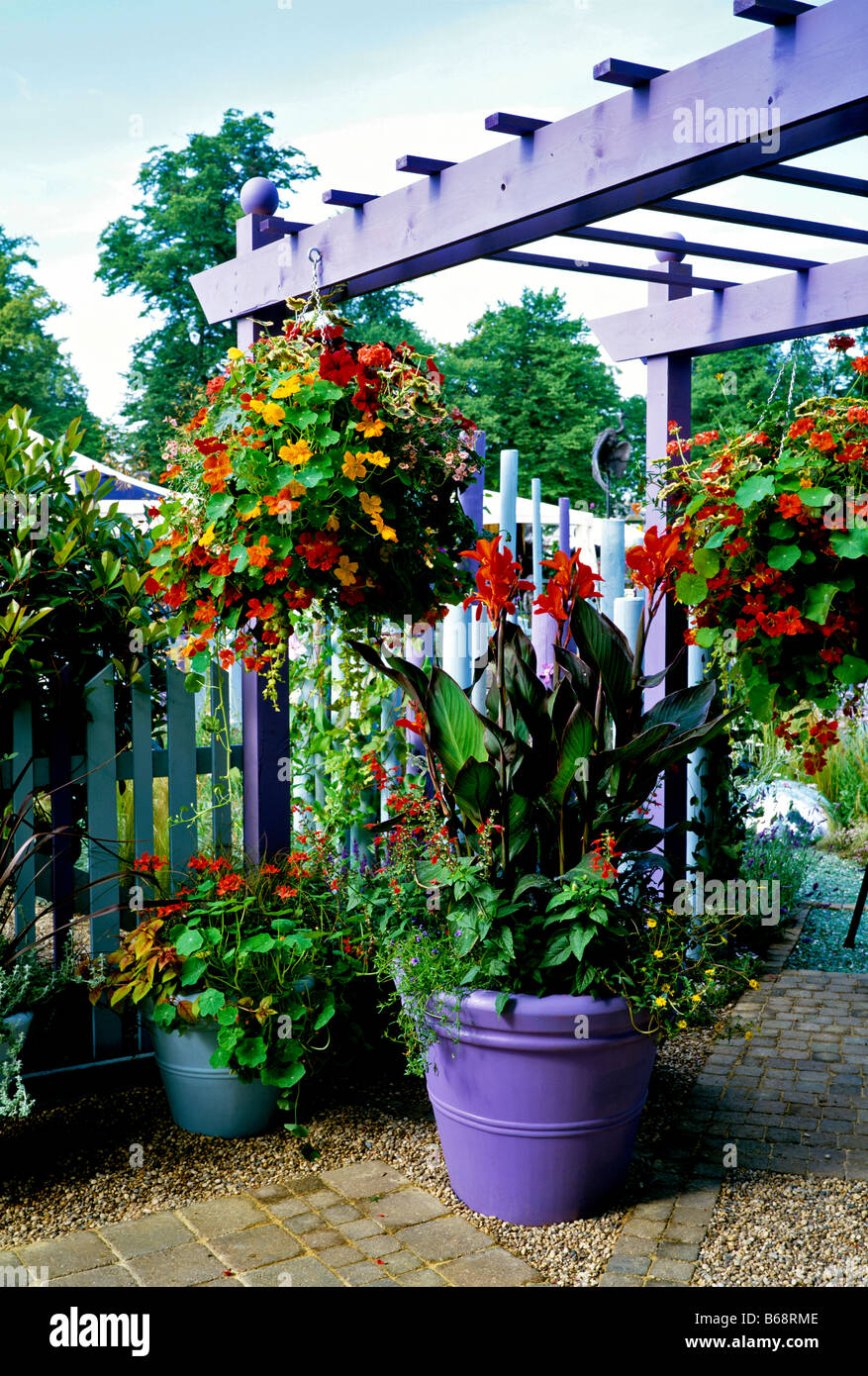Pagoda with containers and hanging baskets Stock Photo - Alamy