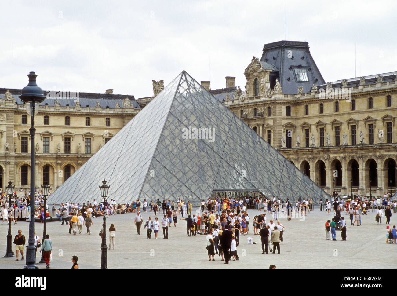 Pyramid entrance to the Louvre in Paris, designed by I. M. Pei Stock ...