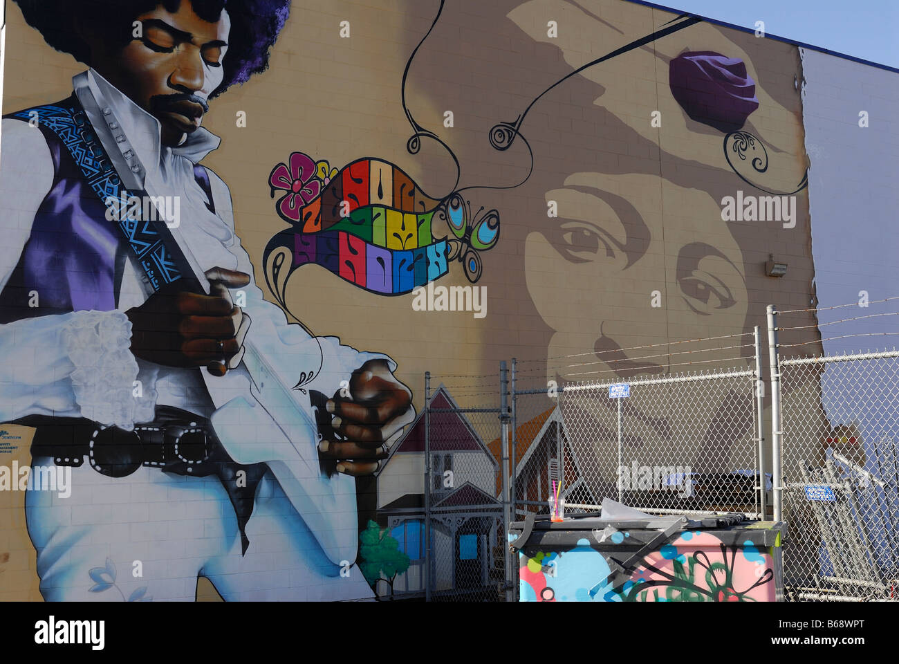 jimmy hendrix graffiti artist on a warehouse in a industrial zone ...