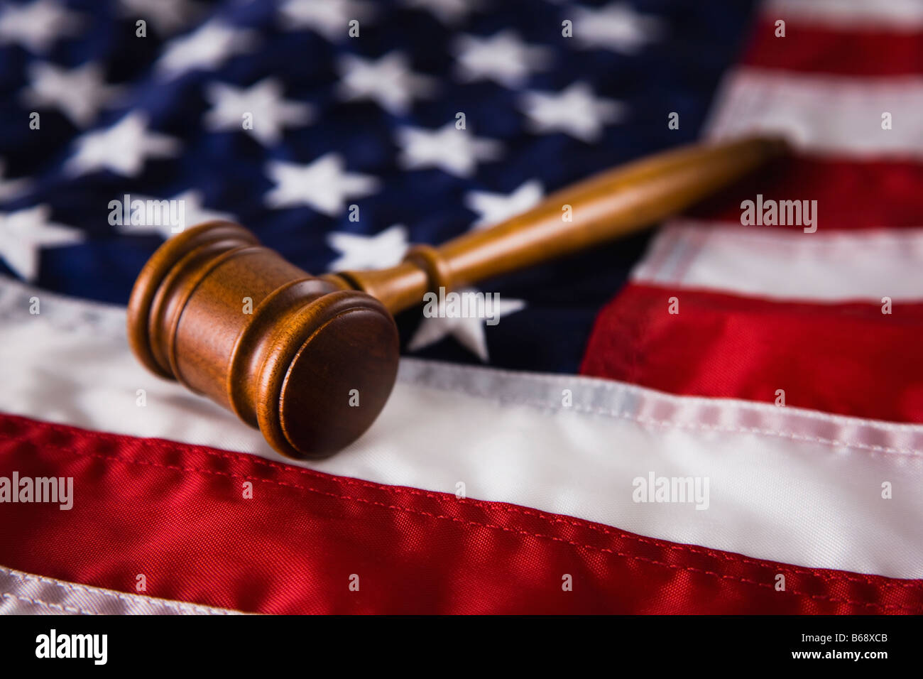 Gavel on American flag Stock Photo - Alamy