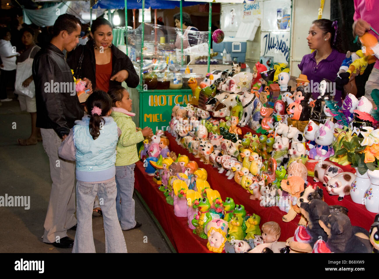 Oaxaca, Mexico. Day of the Dead. Amusement Stand Vendor just outside ...