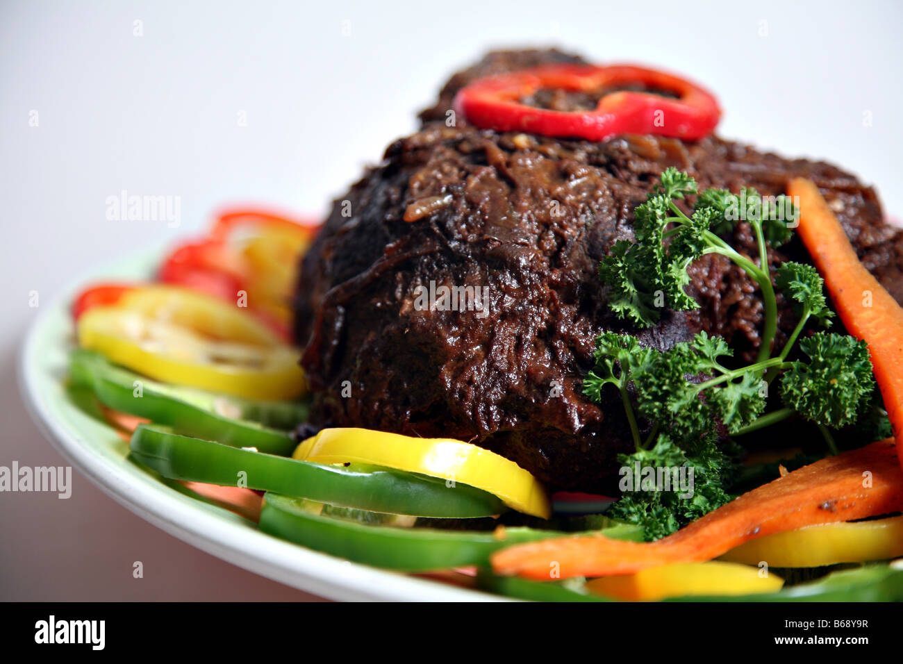 Caribbean meal with beef and vegetables Stock Photo - Alamy