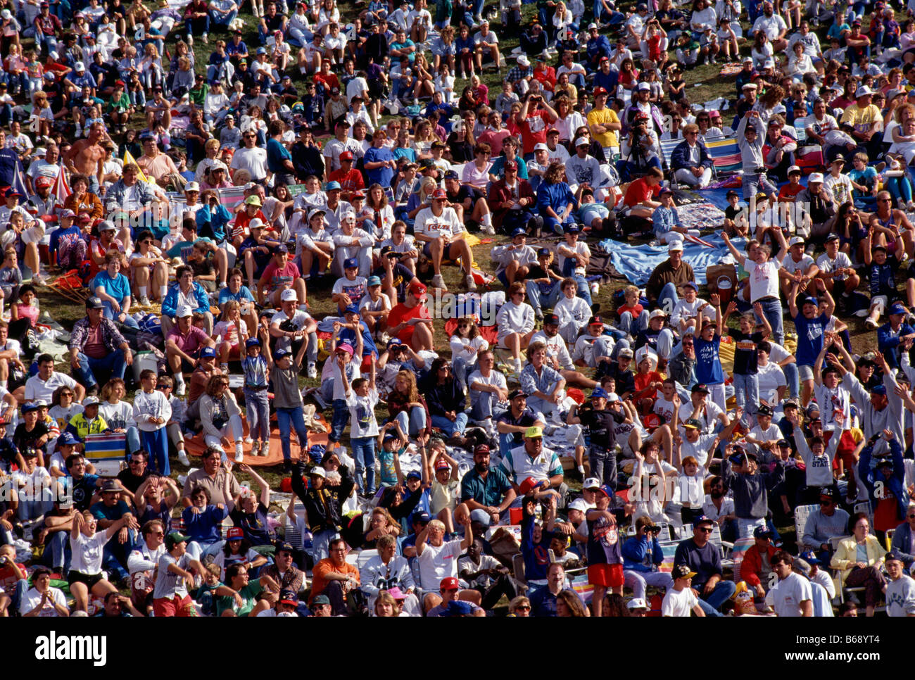 Crowds seated on the hillside beyond center field at the Little League ...