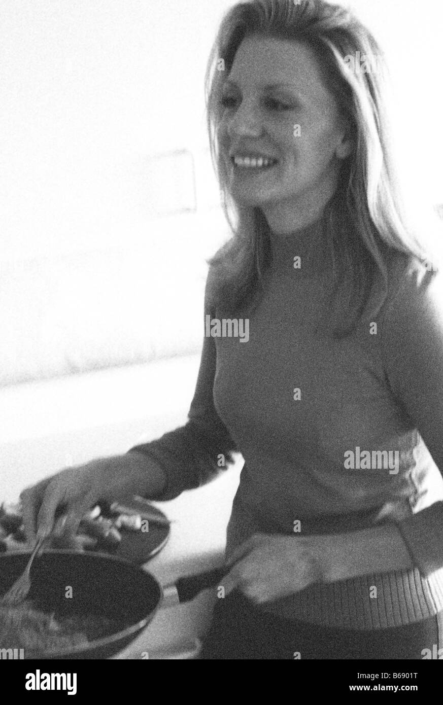 Young woman cooking portrait Stock Photo - Alamy Young woman cooking portrait Stock Photo - Alamy