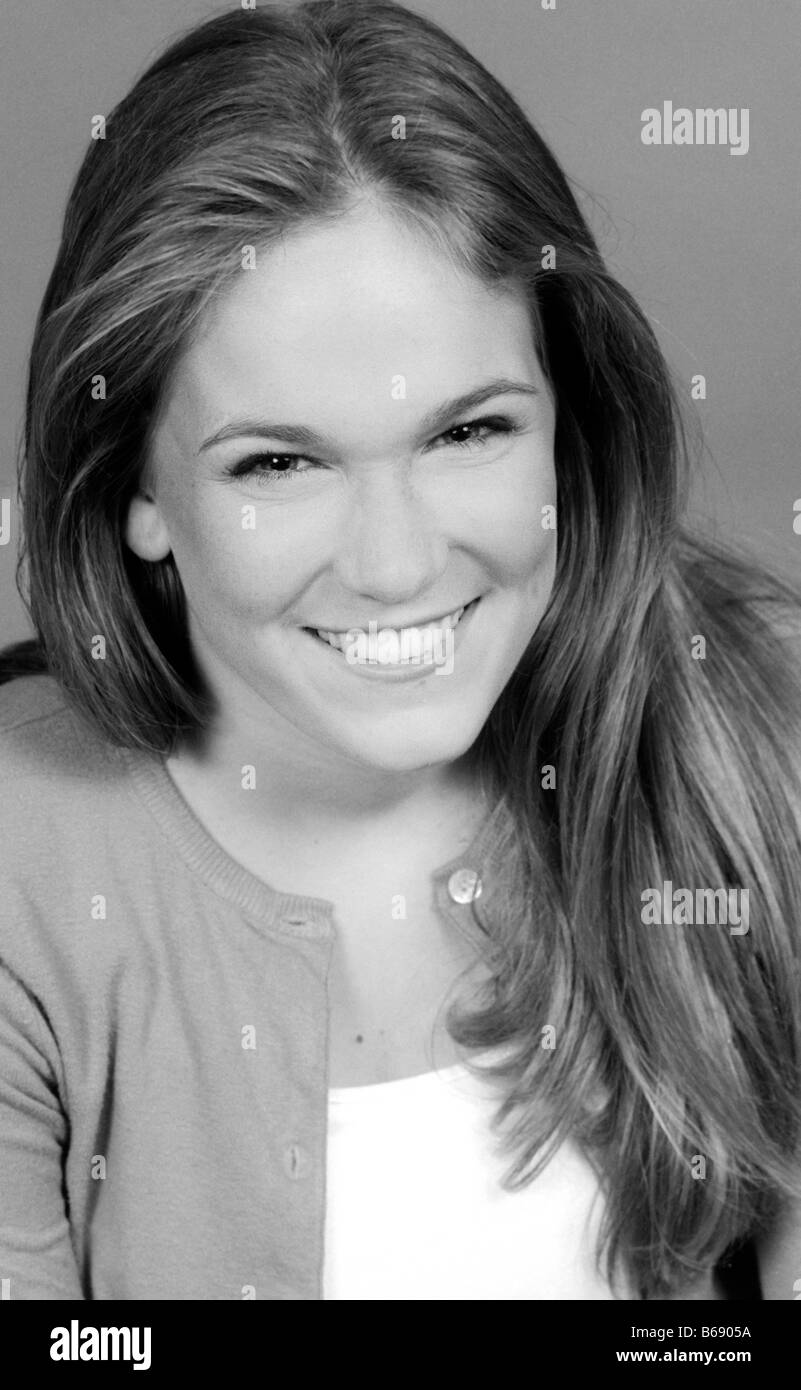 Young woman smiling, portrait Stock Photo - Alamy