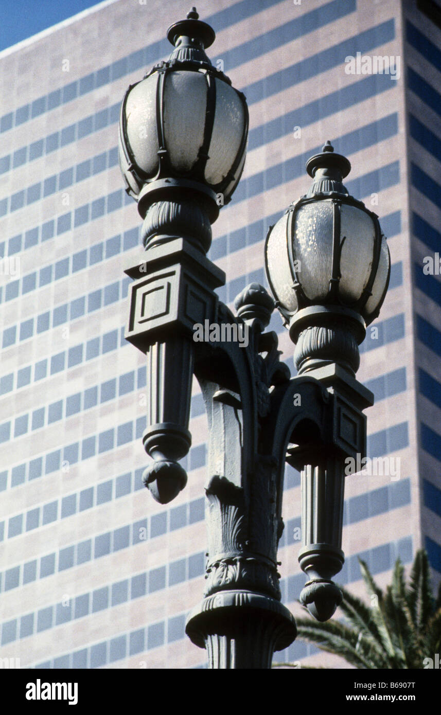 Old fashioned street light against modern building in Los Angeles ...