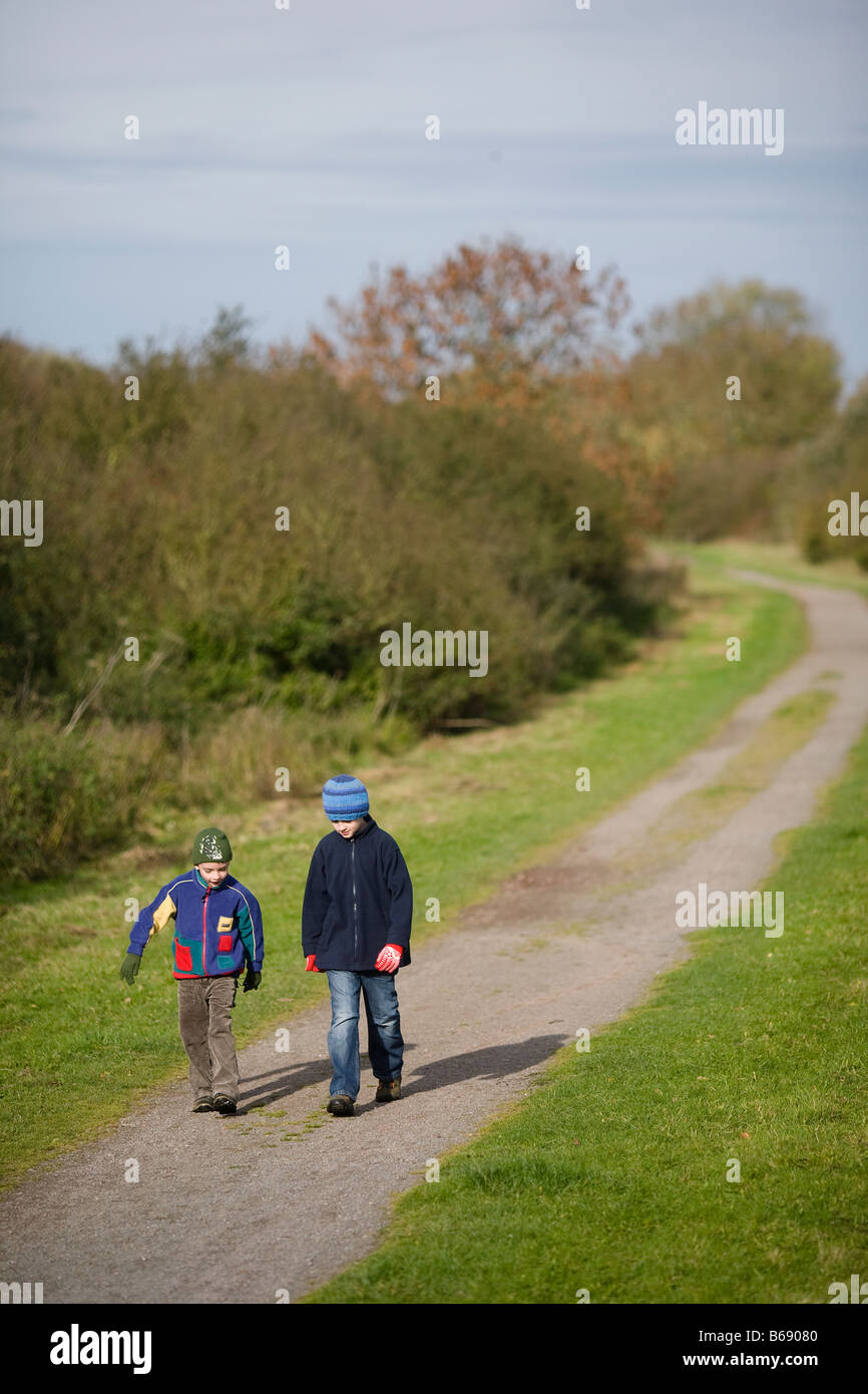 Two boys walk along a path in Northamptonshire MODEL RELEASE AVAILABLE ...