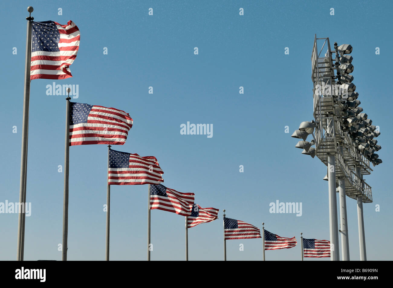Curved row of American flags Stock Photo - Alamy