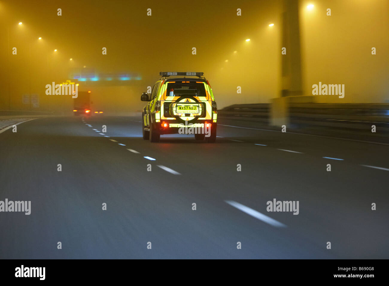 Motorway maintenance vehicle on Motorway at Night Time Stock Photo - Alamy