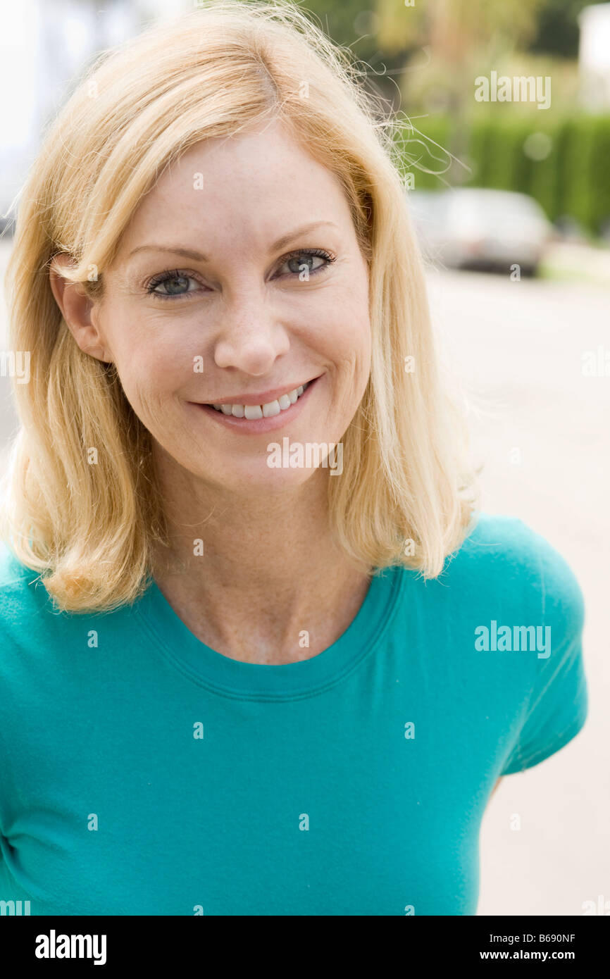 Young woman smiling, portrait Stock Photo - Alamy