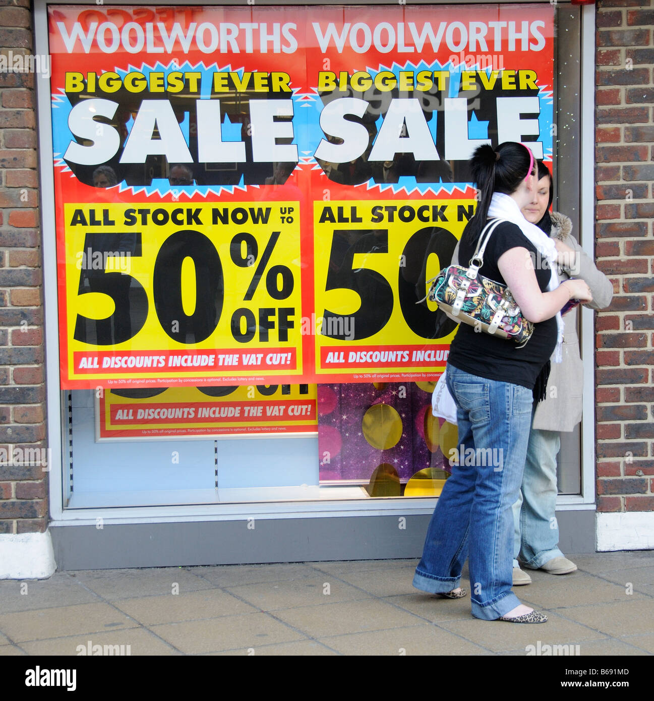 Woolworths store 50% sale posters in shop window Basingstoke Hampshire ...