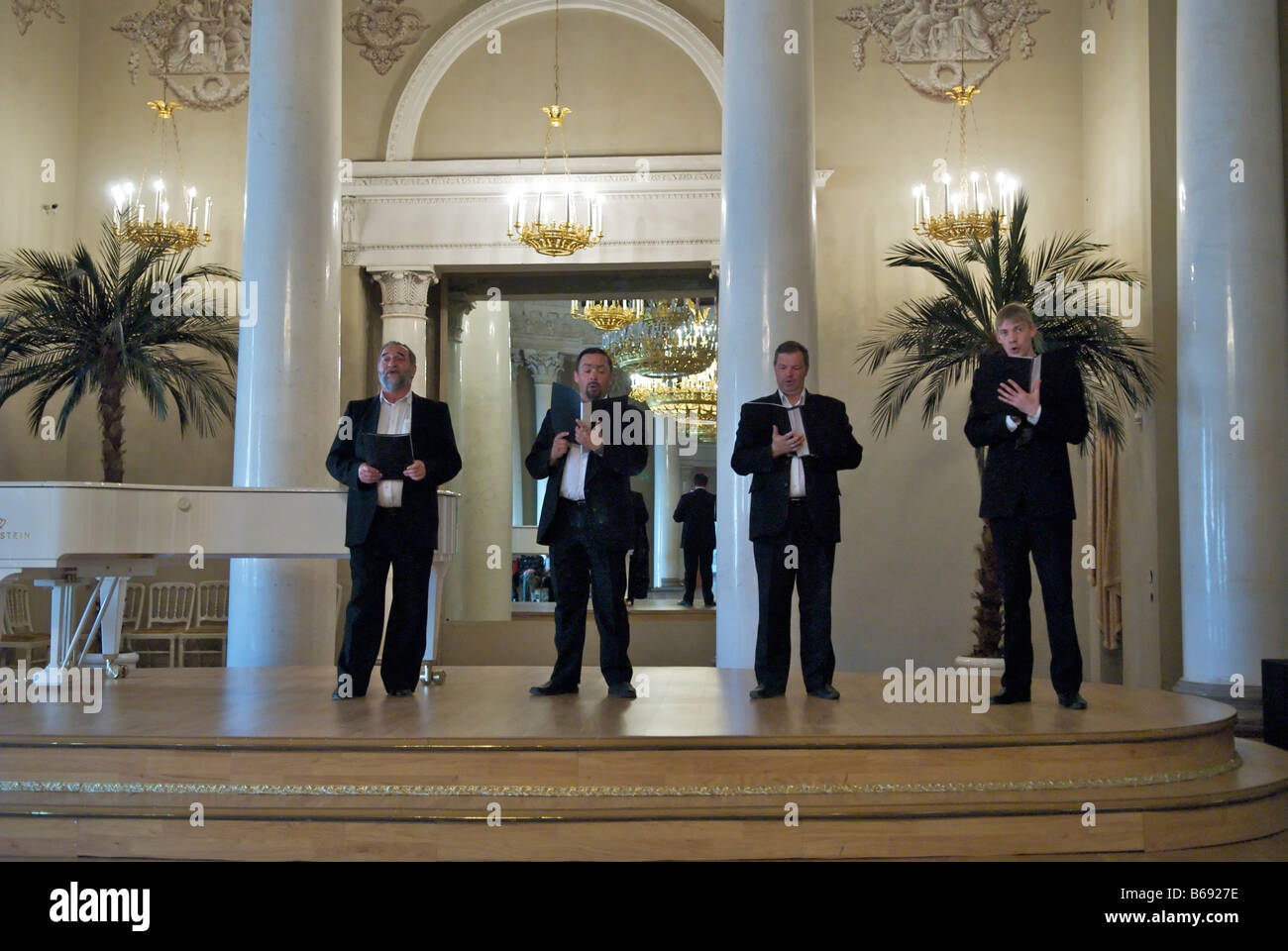 Four male singers performing in concert hall Yusupov Palace or Moika ...
