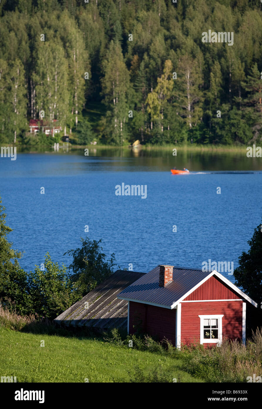 Finnish red sauna by a lake , Finland Stock Photo - Alamy