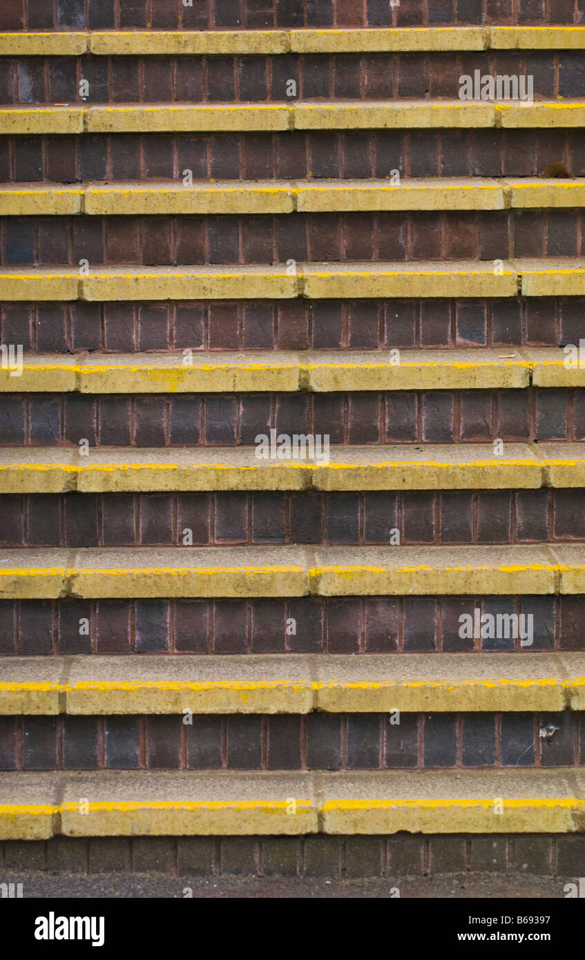 Brick steps with yellow edging Stock Photo - Alamy