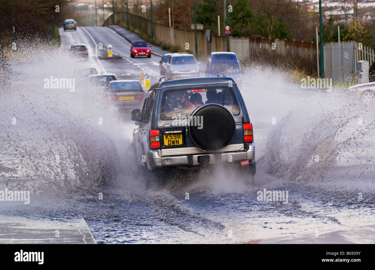 Torrential rain flood road car splash traffic hi-res stock photography ...