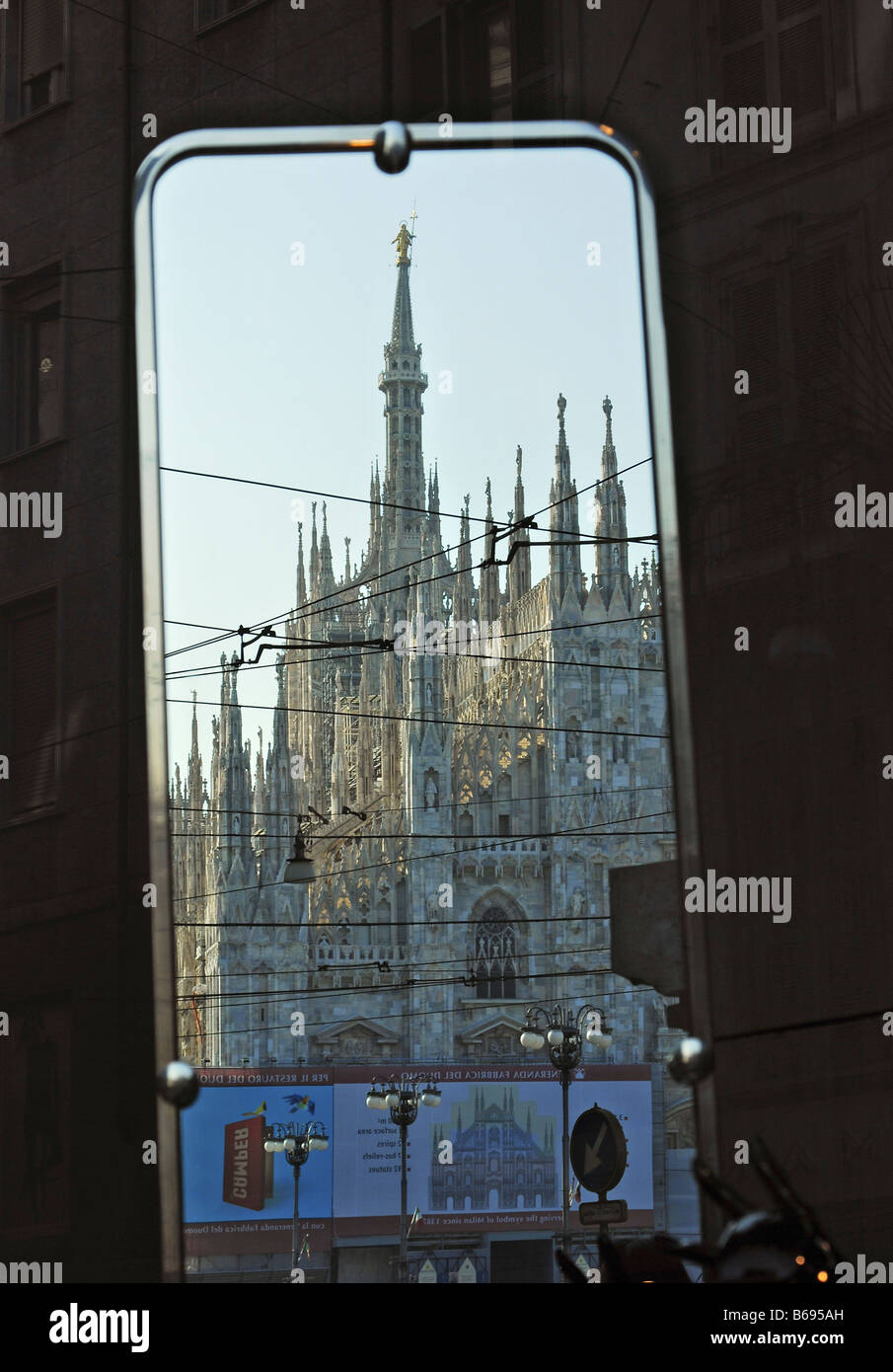the cathedral of Milan reflected on the mirror of a shop Italy Stock ...