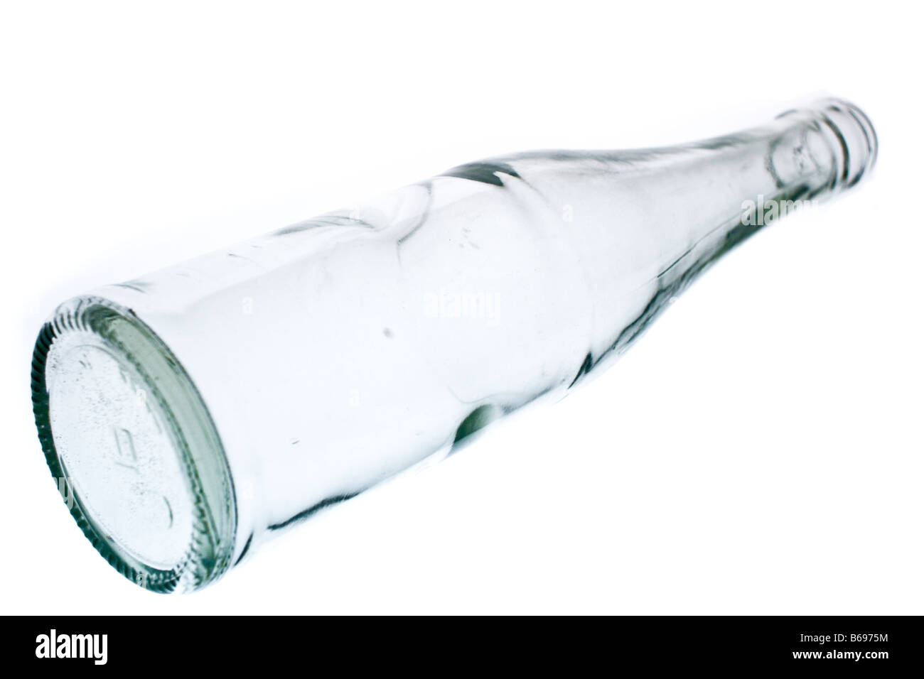 Glass bottle on table Cut Out Stock Images & Pictures - Alamy