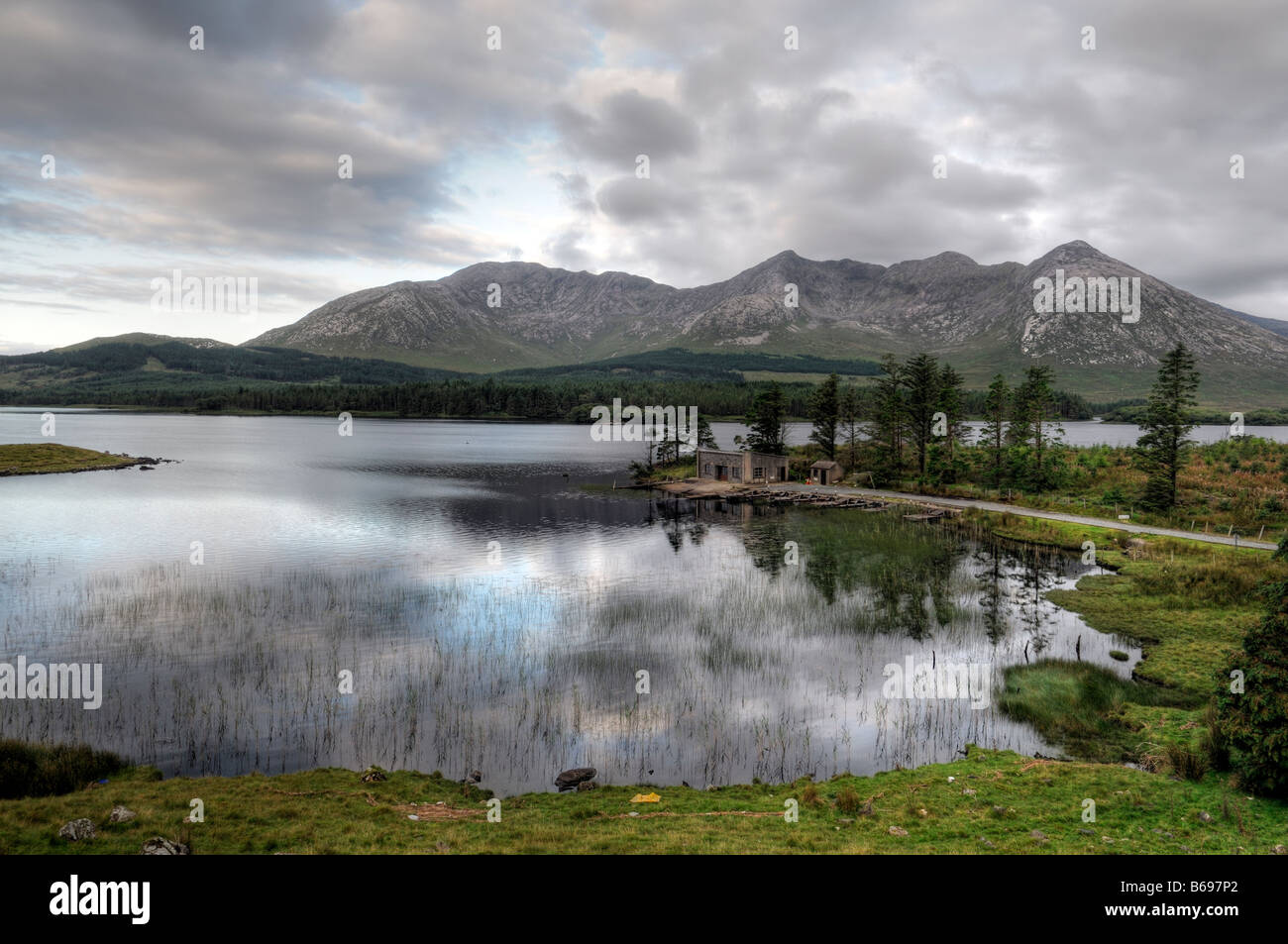 Connemara, Lough Inagh lake in the Inagh Valley Mirror like reflection ...