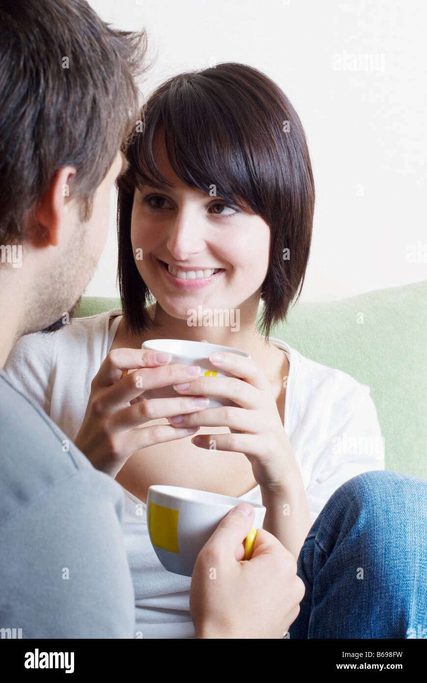 Couple drinking tea together Stock Photo - Alamy