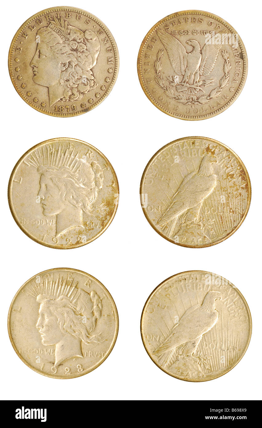 Both sides of three antique Liberty Dollar coins isolated on white ...