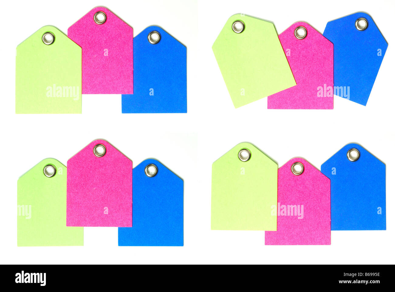 Three blank colored tags isolated on a white background Stock Photo - Alamy