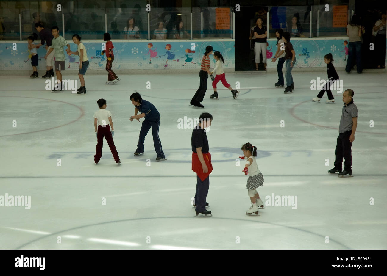 people skating in the ice rink Stock Photo - Alamy