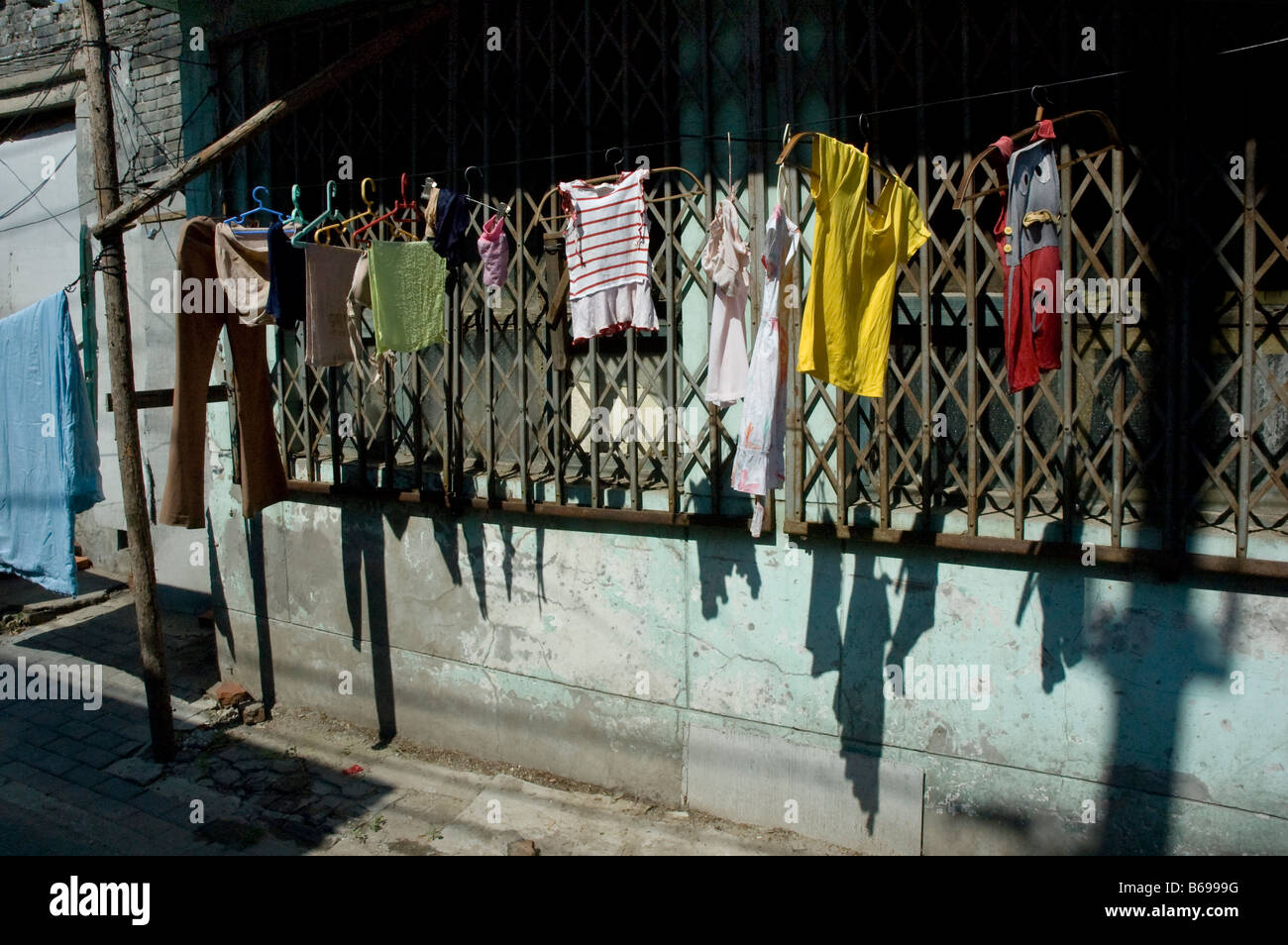 hanging clothes for drying Stock Photo - Alamy