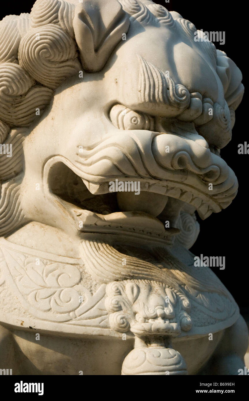 typical chinese stone lion Stock Photo - Alamy