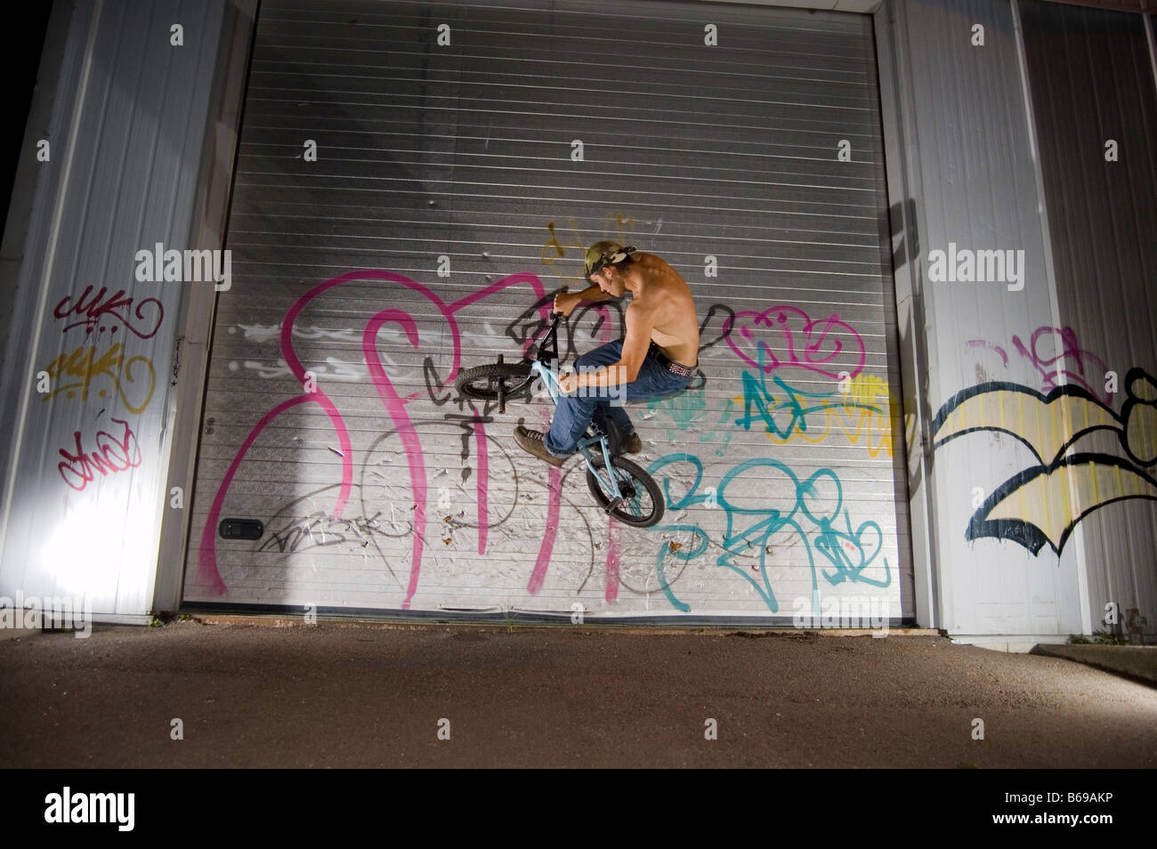 BMX'er doing wallride Stock Photo - Alamy
