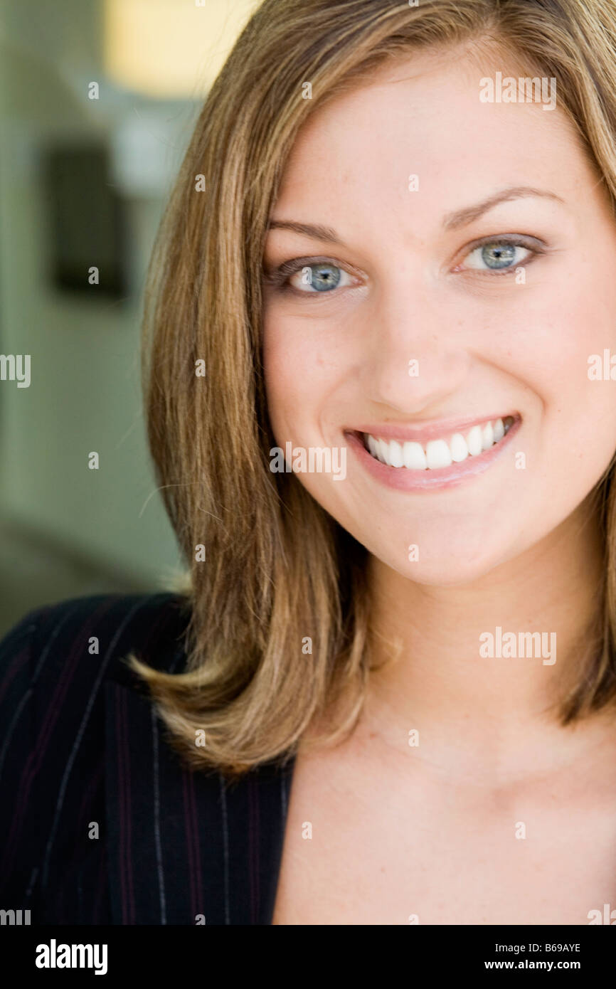Young woman smiling, portrait Stock Photo - Alamy