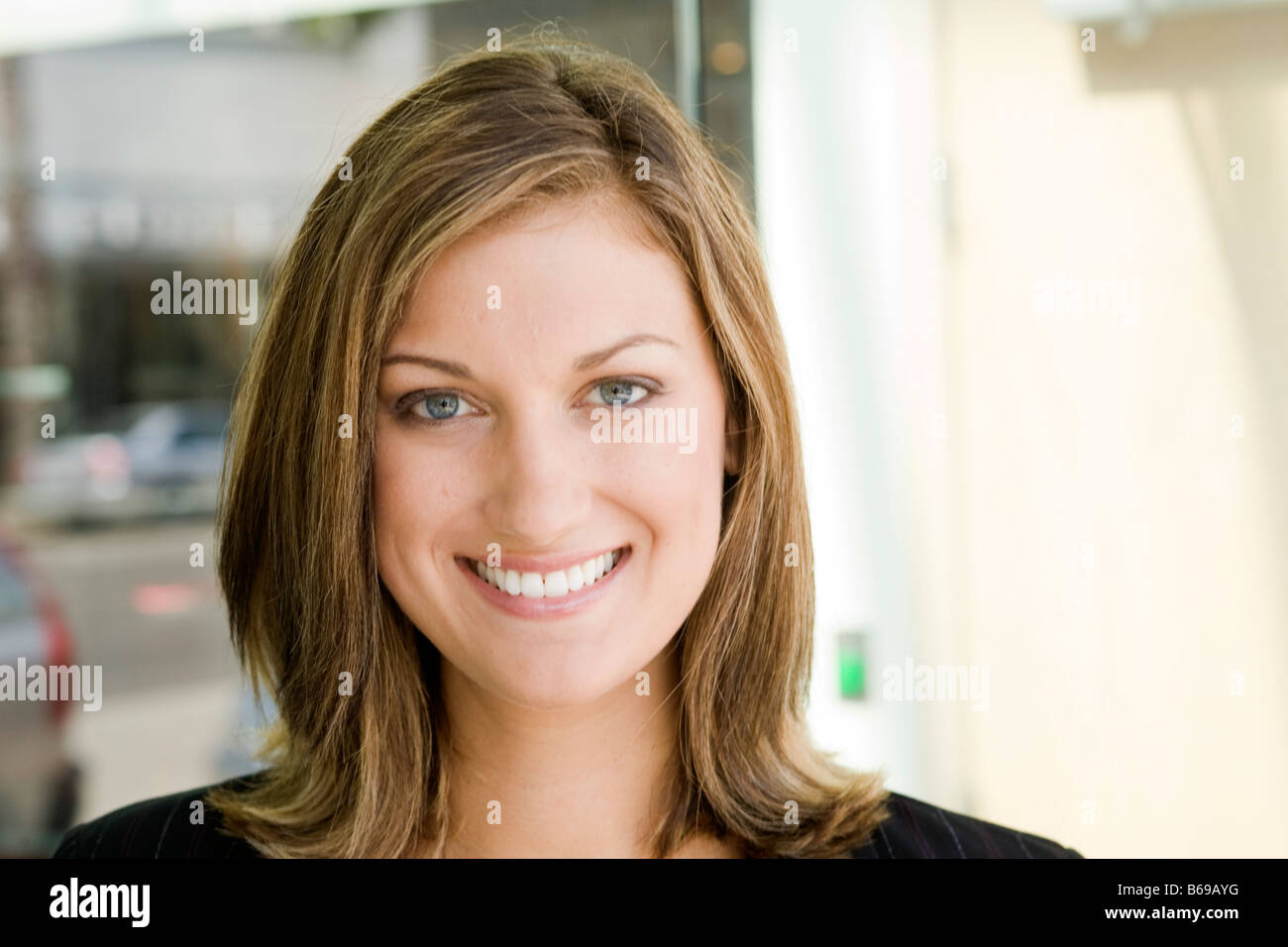 Young woman smiling, portrait Stock Photo - Alamy