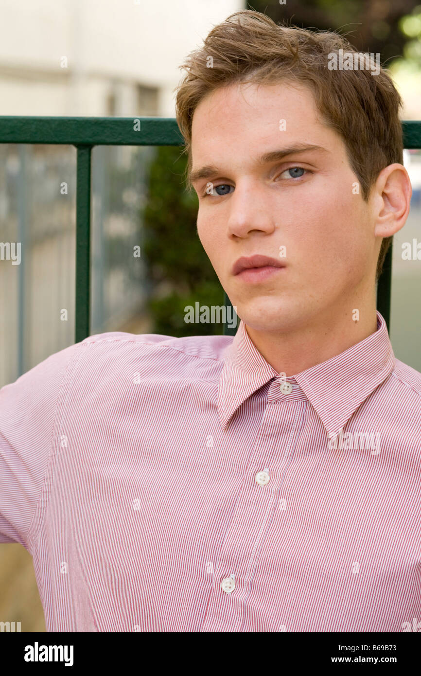 Young man serious, portrait [looking down] Stock Photo - Alamy