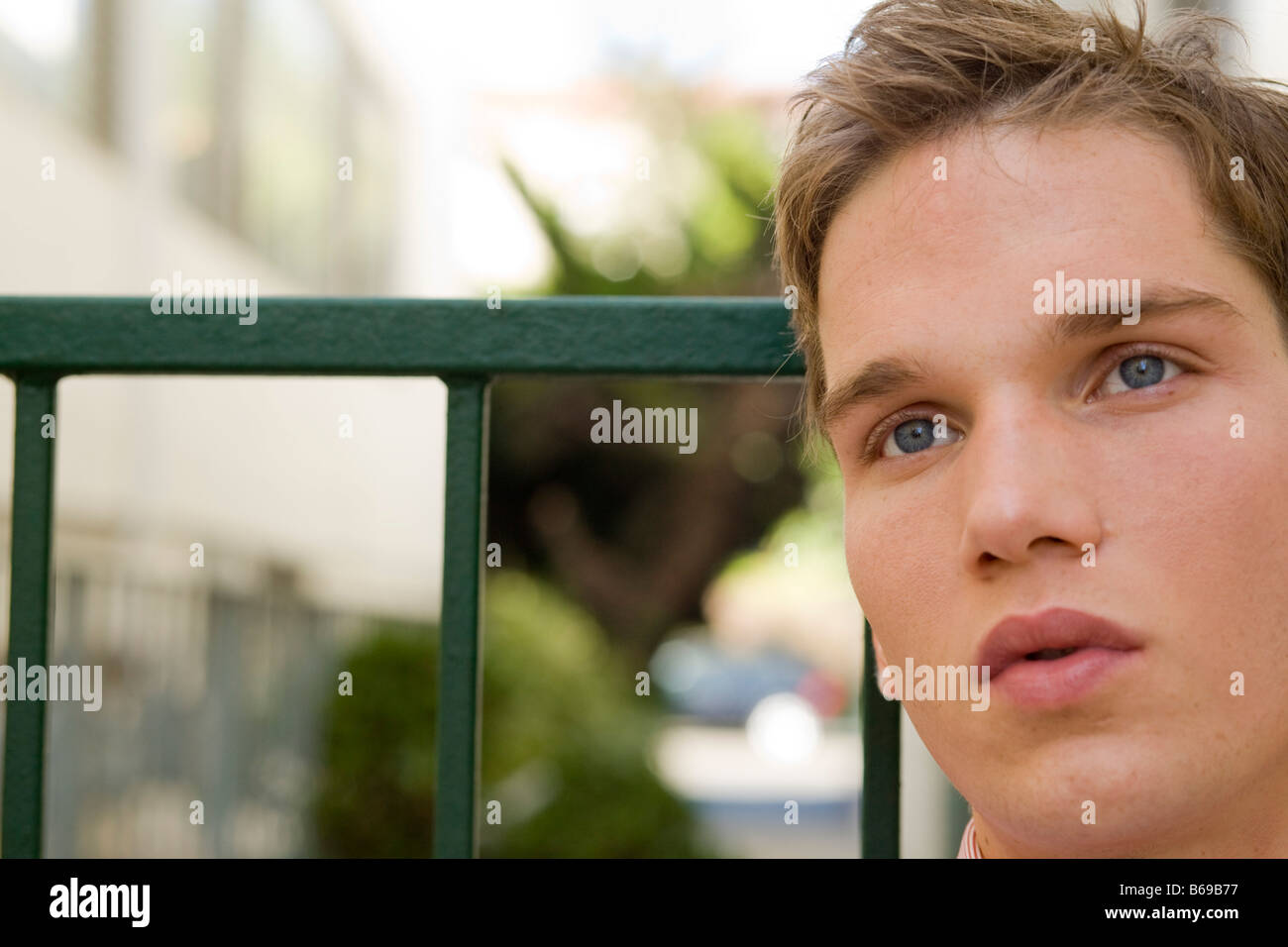 Young man serious, portrait [looking down] Stock Photo - Alamy