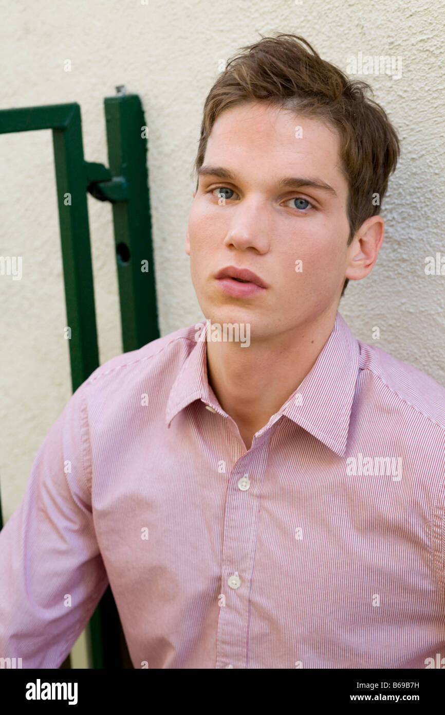 Young man serious, portrait [looking down] Stock Photo - Alamy