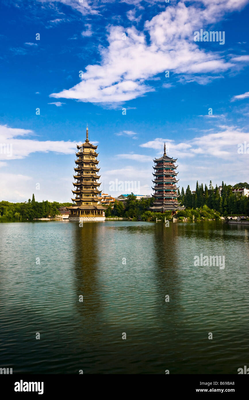 Pagodas at lakeside, Sun And Moon Pagoda, Banyan Lake, Guilin, Guangxi ...