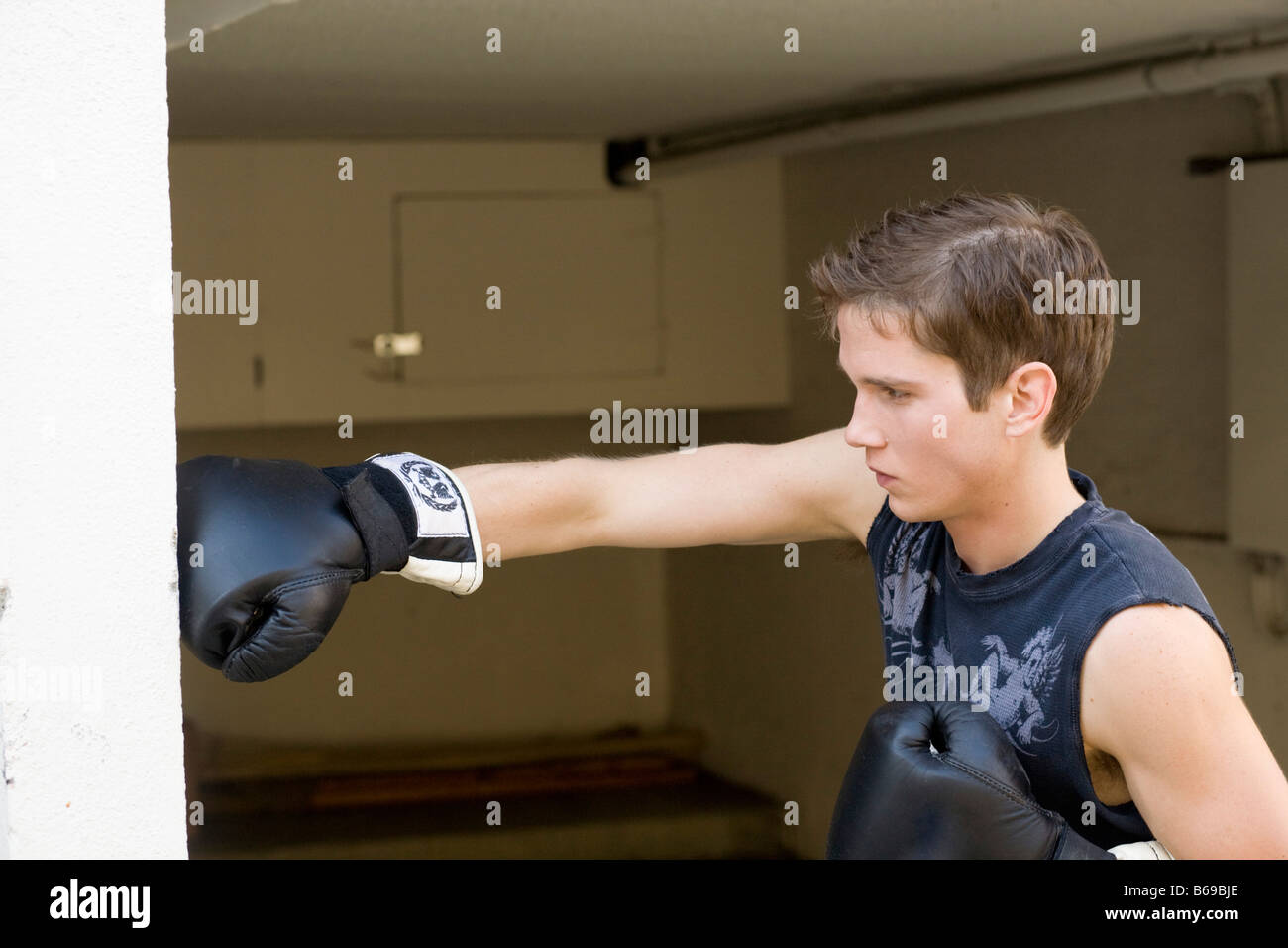 Young man practicing boxing side hi-res stock photography and images ...
