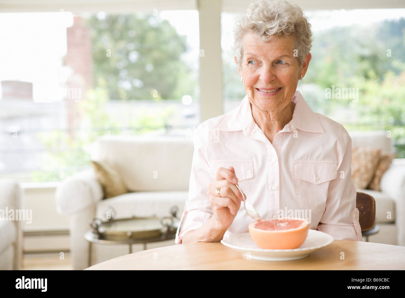 Section of grapefruit on spoon hi-res stock photography and images - Alamy