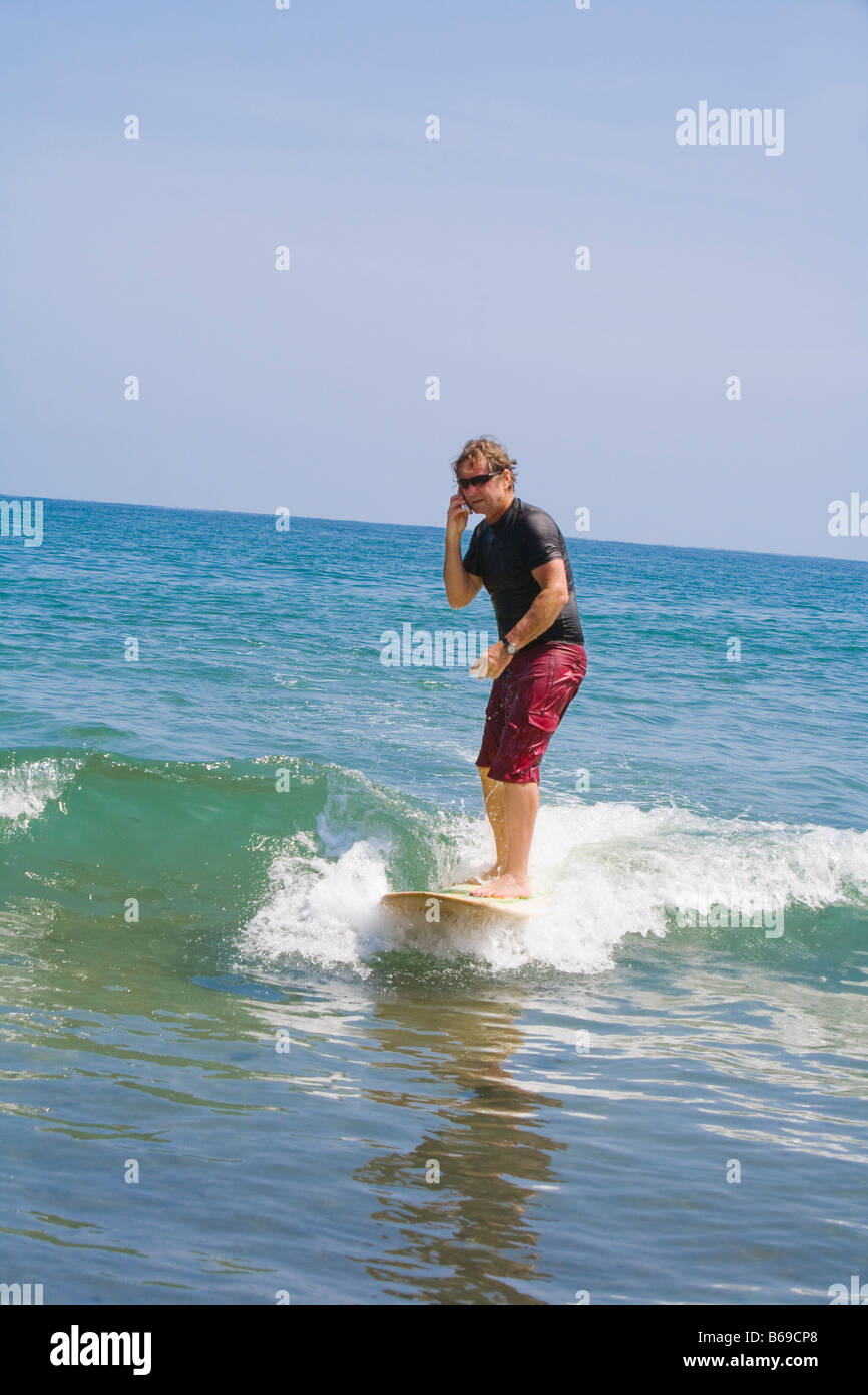 Surfing balance hi-res stock photography and images - Alamy