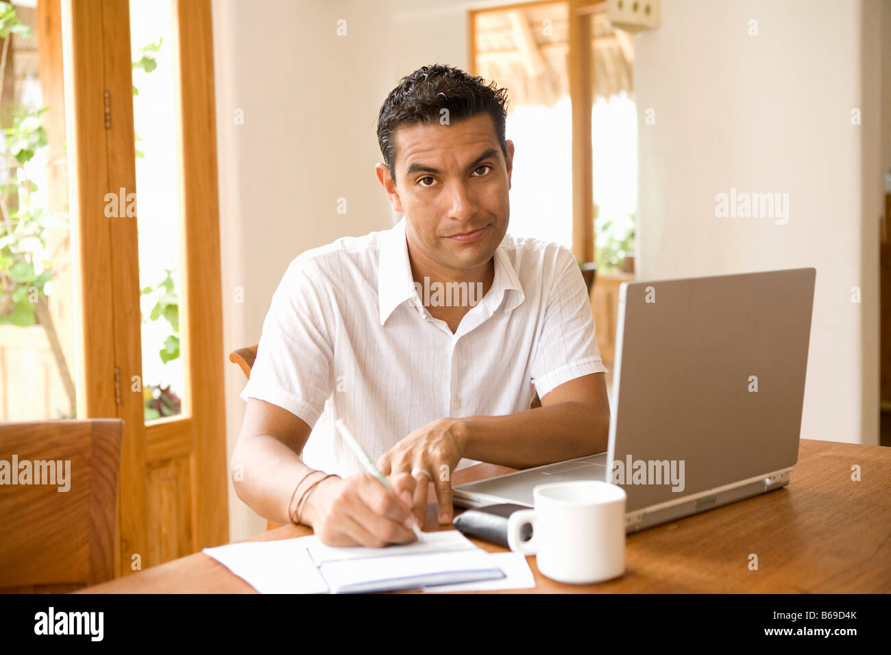 Man check shirt front house hi-res stock photography and images - Alamy