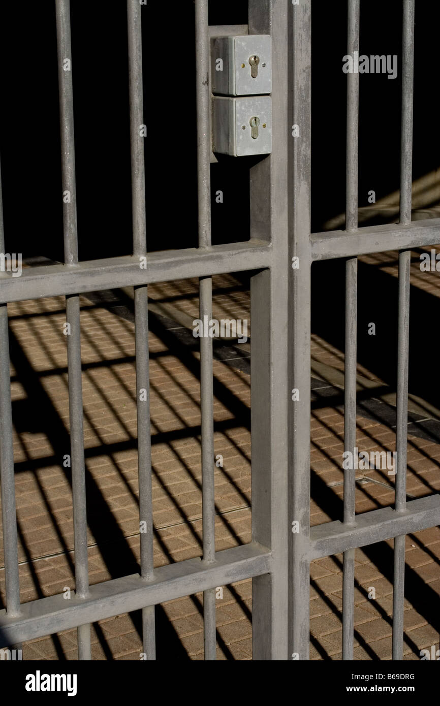Metal gates prison hi-res stock photography and images - Alamy