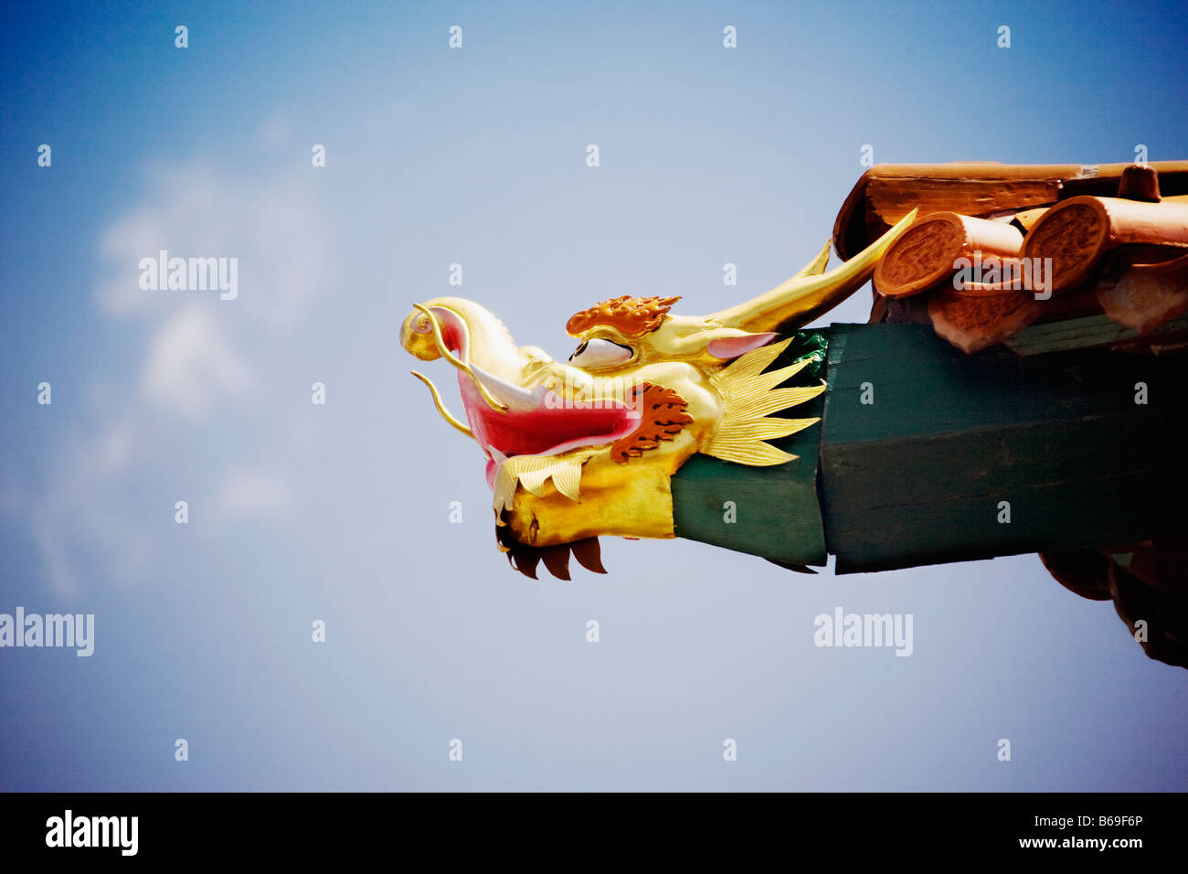 Low angle view of a sculpture on roof of a temple, Da Zhao Temple ...