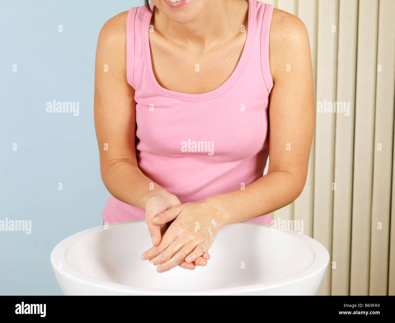 Young Woman Washing Hands Model Released Stock Photo - Alamy