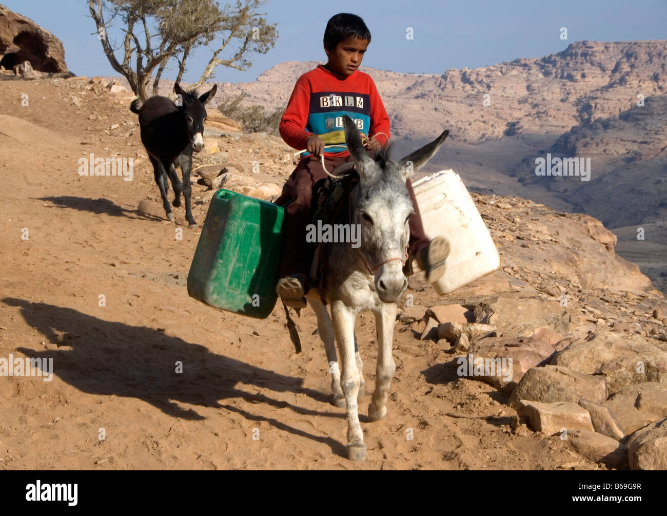 Boy on a donkey hi-res stock photography and images - Alamy