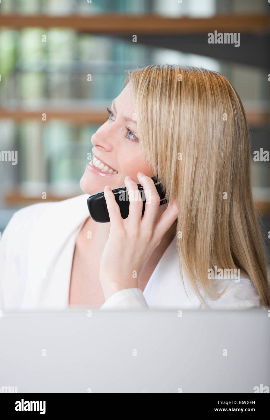 Female on her mobile phone Stock Photo - Alamy