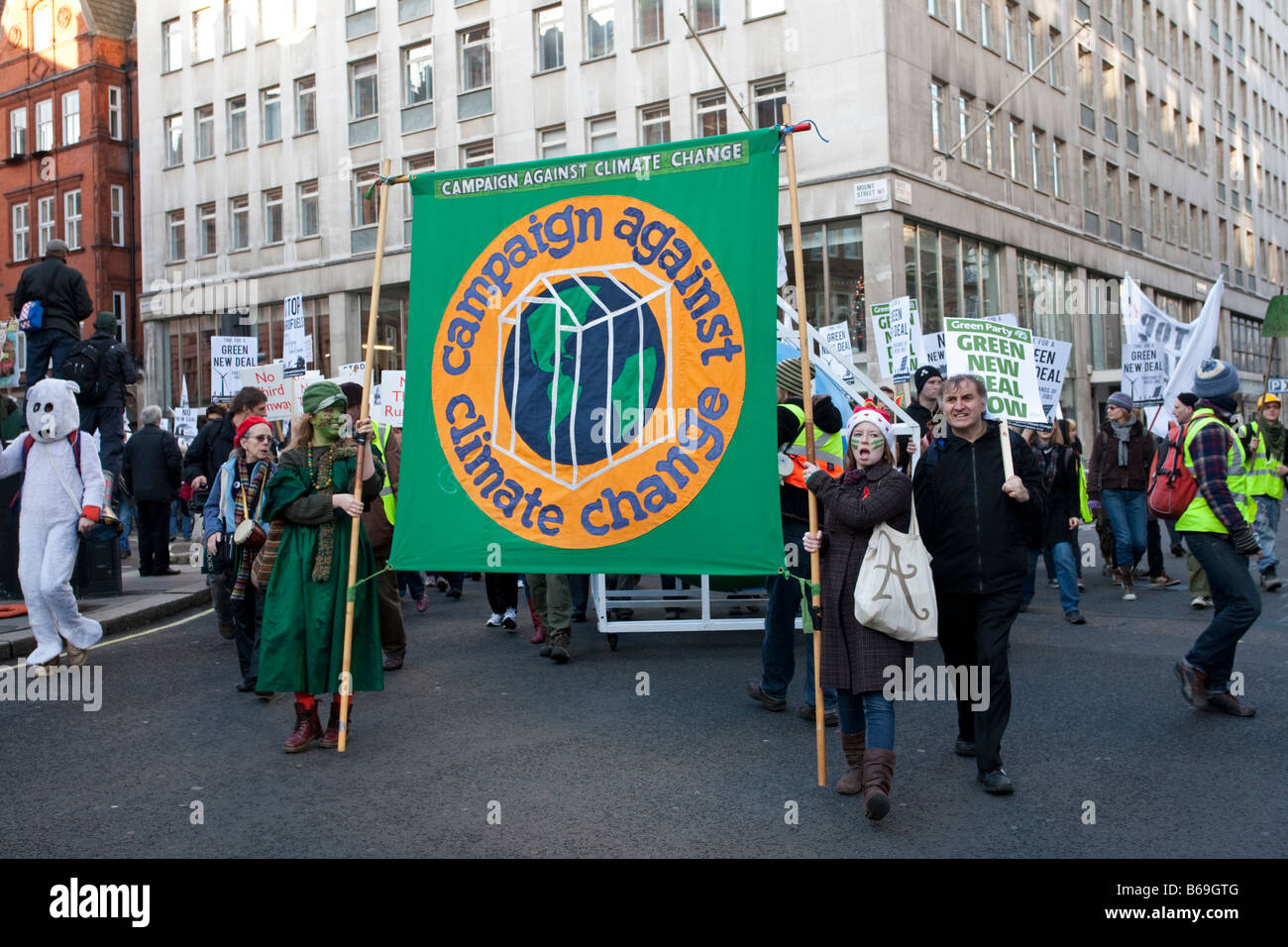 Campaigners with Campaign Against Climate Change banner March London ...